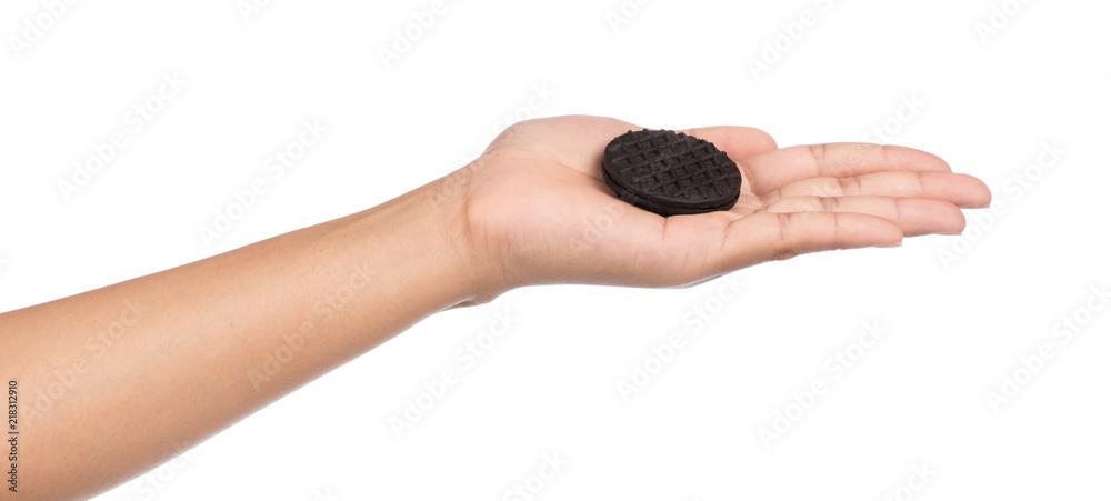 hand holding Oreo cookies with cream milk isolated on white background ...