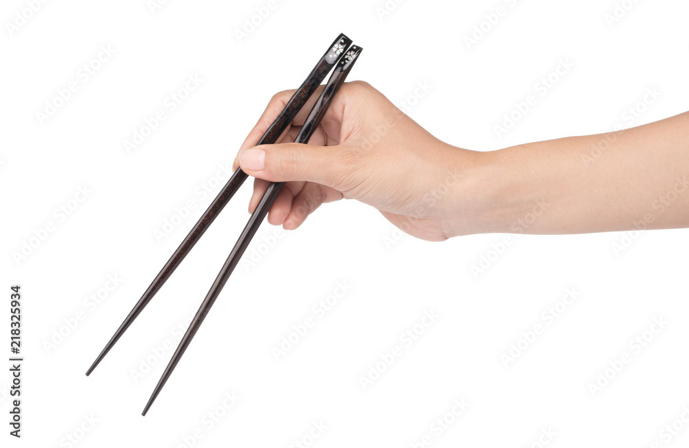 hand holding Chopsticks for eat food isolated on a white background ...