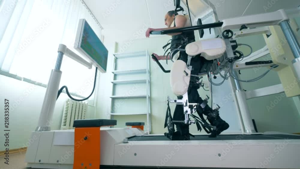 One man uses modern device to recover from a trauma, side view. Stock ...