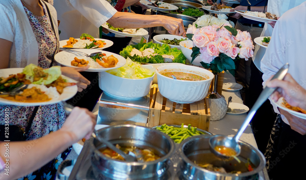 scooping the food, Buffet food at restaurant, catering food, food ...