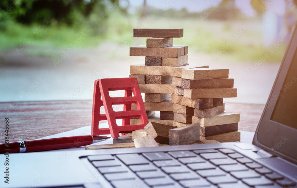 People use the wooden block and computer to help to design the building ...