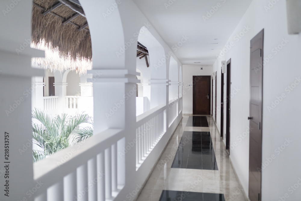 Contemporary white architecture, walkway and balcony in a luxury hotel ...