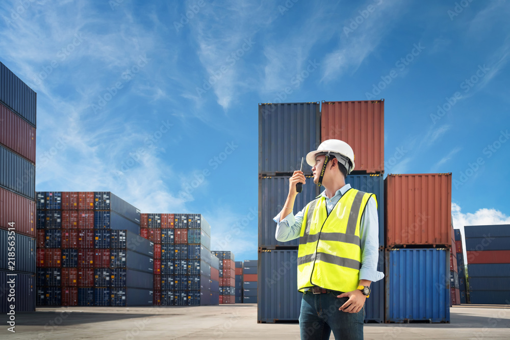 Foreman control loading Containers box from Cargo freight ship i Stock ...