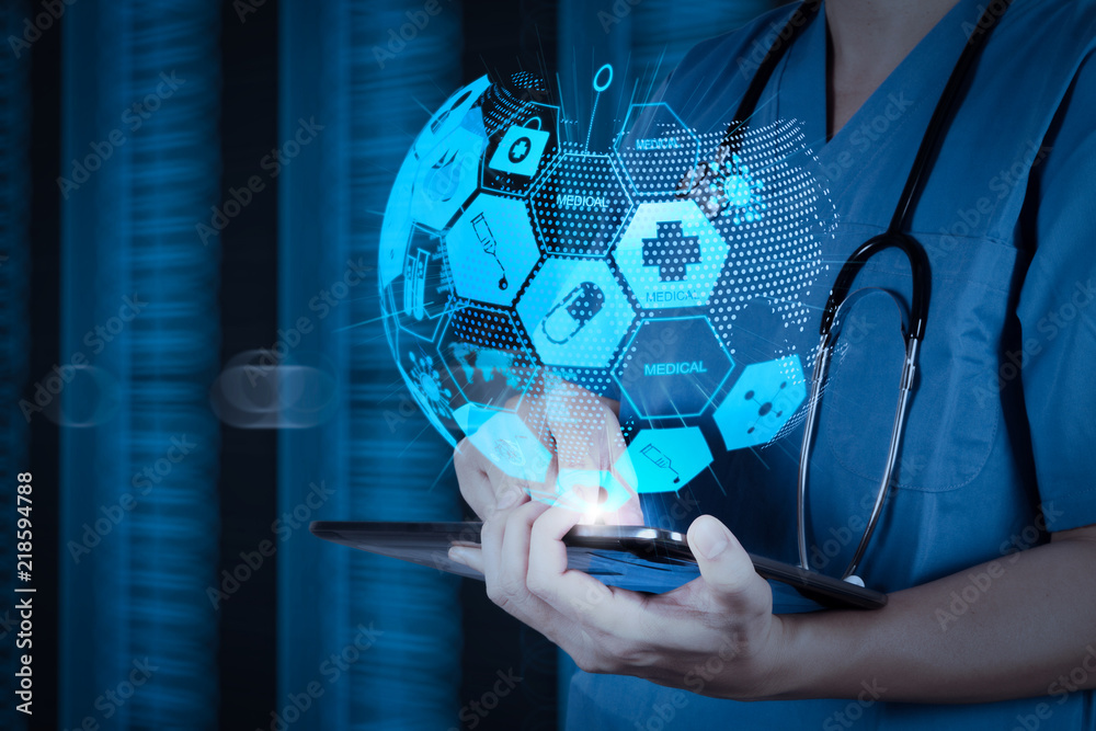 Doctor working on a digital tablet with digital background as concept ...