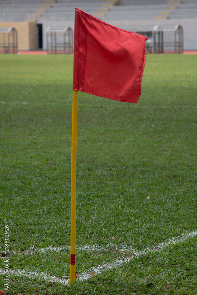 Red flag pole at corner kick marking of soccer field Stock Photo ...