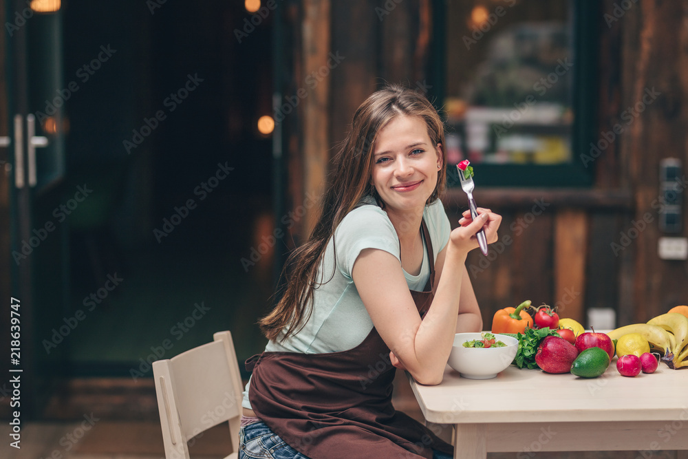 Young girl eating Stock Photo | Adobe Stock