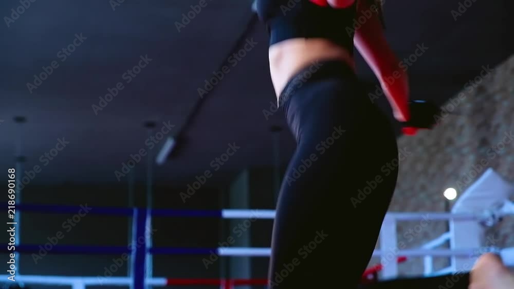 Vidéo Stock Girl athlete trains in the Boxing gym. The process of ...
