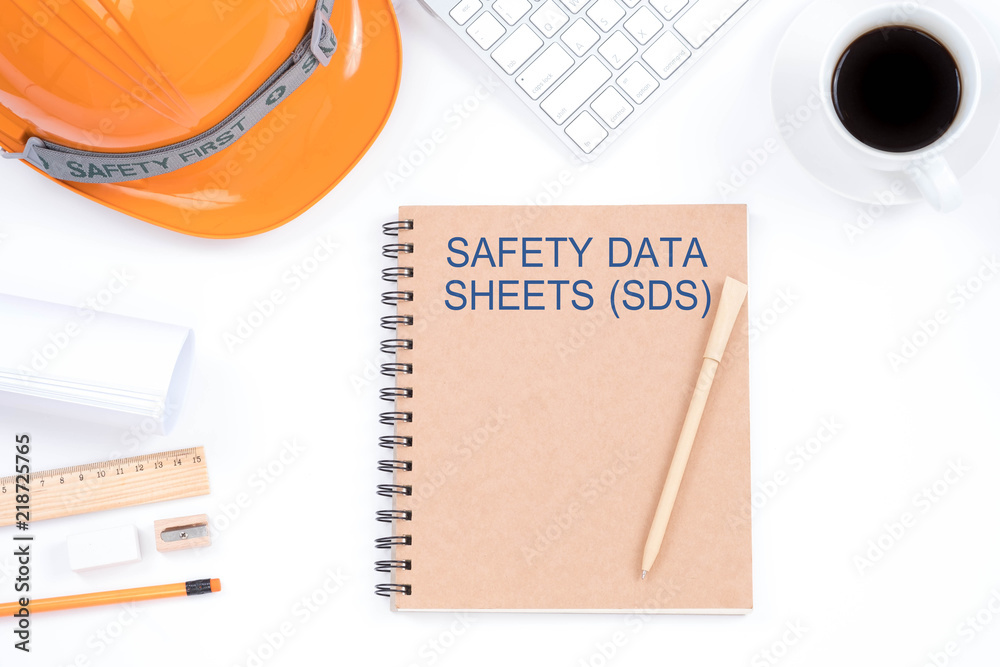 Concept SAFETY DATA SHEETS (SDS). Top viwe of modern workplace with ...