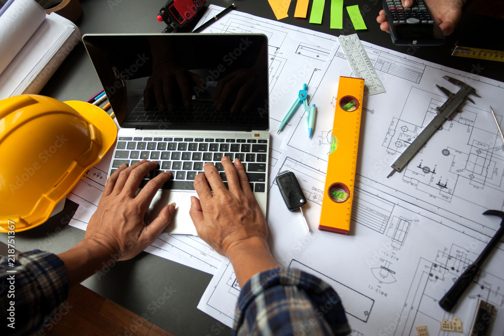 Architects are working with computers and drawing tools , Engineering ...