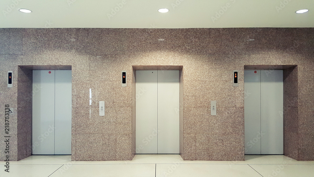 Open and closed chrome metal office building elevator doors realistic ...