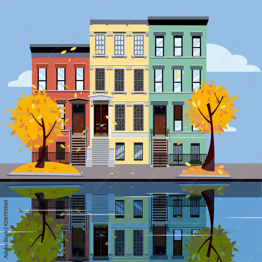 Colored apartment buildings on lake. Facades of buildings are reflected ...