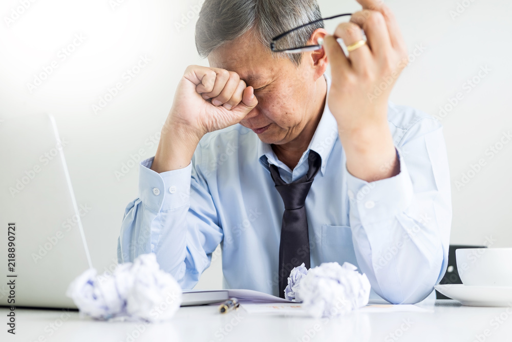 Depressed failure and tired businessman late sad and solving problem in ...