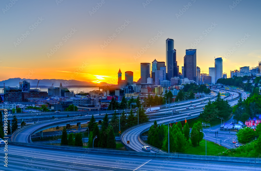 Seattle skylines and s-curved I-90, I-5 highway interchange traffic ...