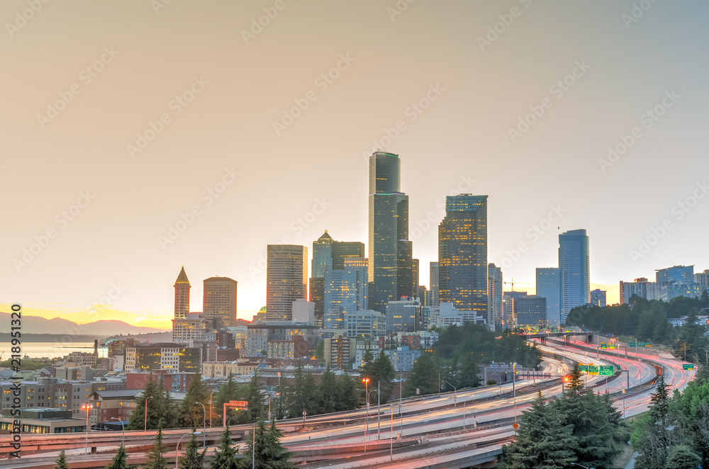 Seattle skylines and s-curved I-90, I-5 highway interchange traffic ...