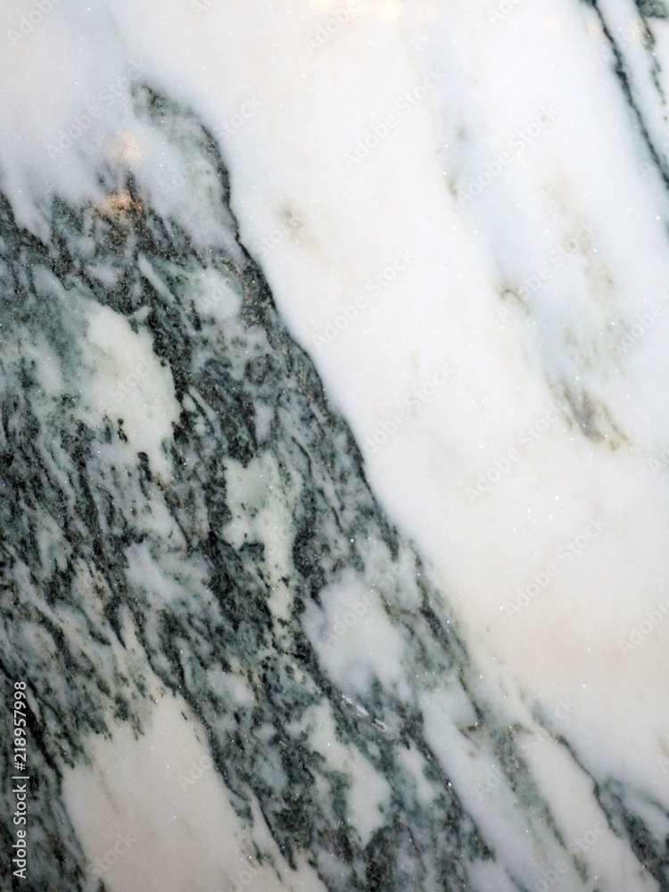 Black and White Marble Surface with a Diagonal Line Dividing the Mostly ...