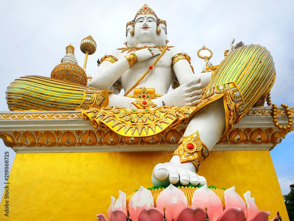 Looking up of big white Brahma statue on blue sky background inat Saman ...