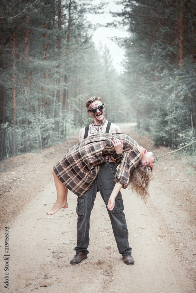 Cannibal steampunk Man with ax and his victim in forest Stock Photo ...