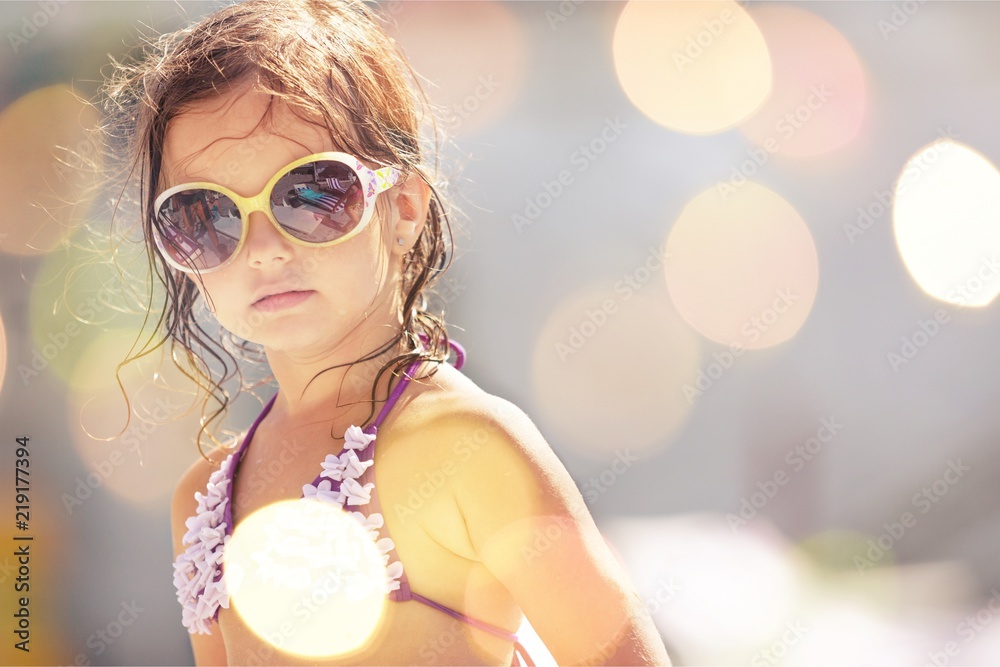 Beautiful girls at swimming pool in summer Stock Photo | Adobe Stock