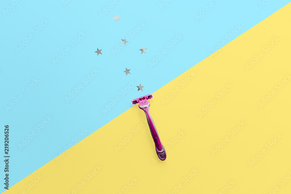 image of shaver. Safety razor on yellow and blue background, for men or ...