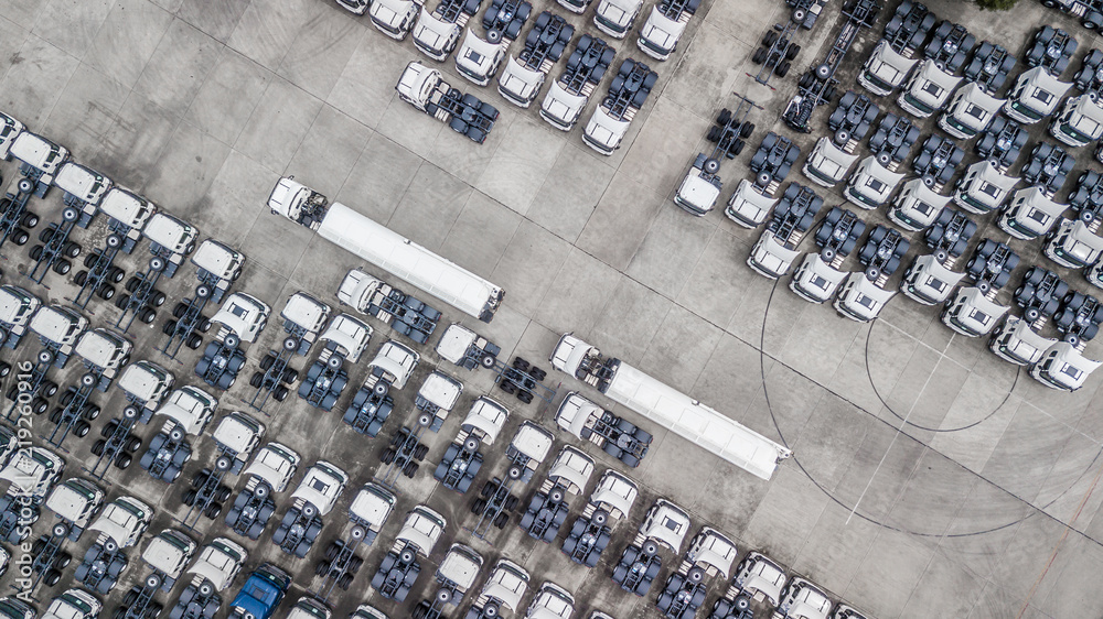 Aerial top view of white cargo trailer parking, trailer line up for ...