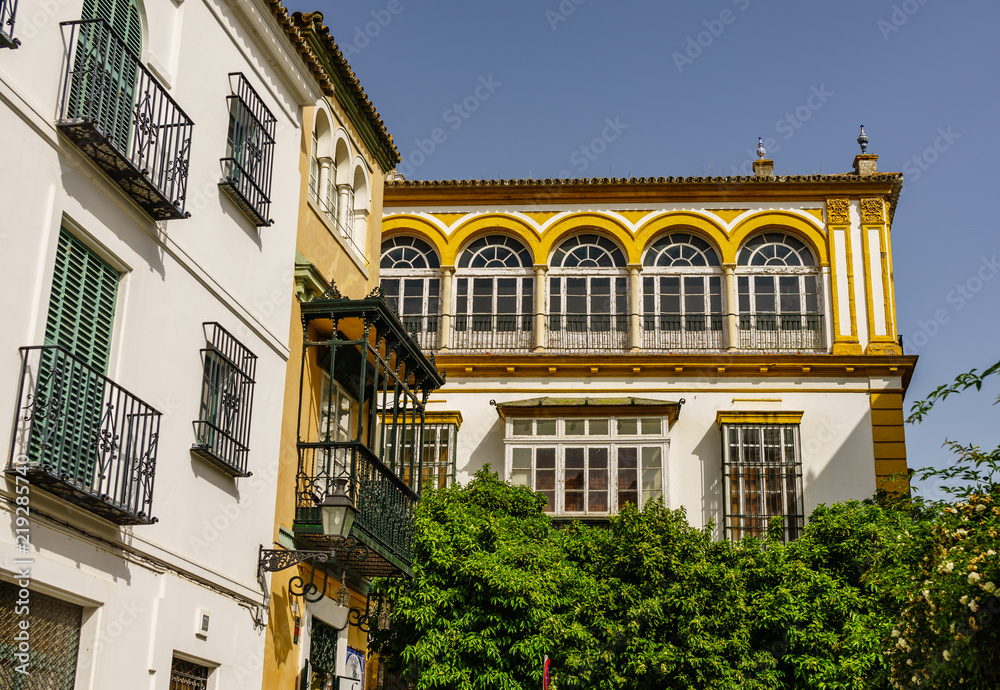 Old Spanish building with balconies in Seville, Spain. A mix of ...