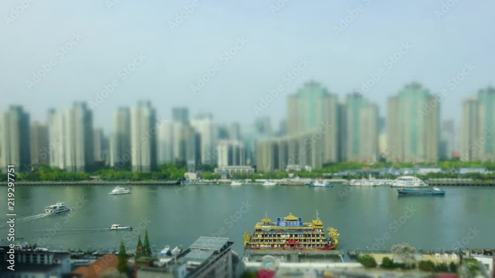 Tilt shift timelapse of Shanghai Huangpu river ships moving past. Major ...
