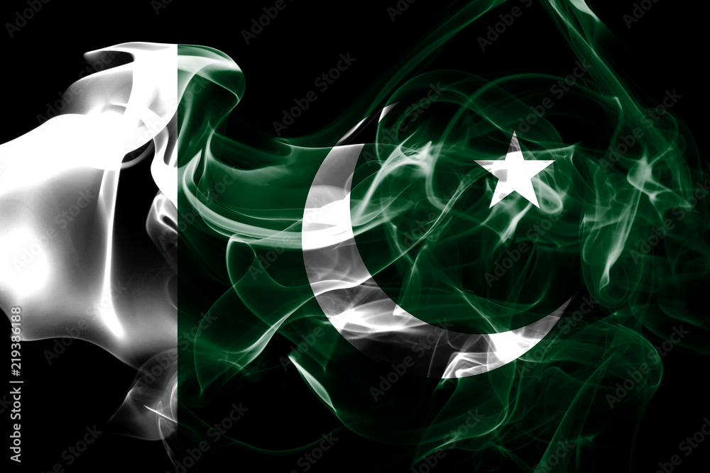 National flag of Pakistan made from colored smoke isolated on black ...