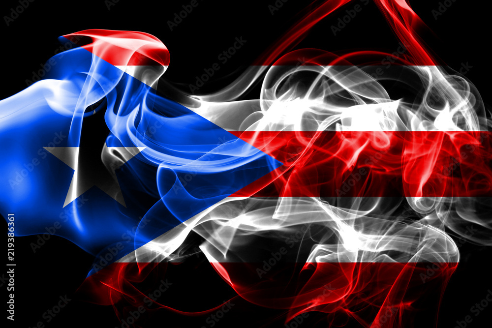 National flag of Puerto Rico made from colored smoke isolated on black ...