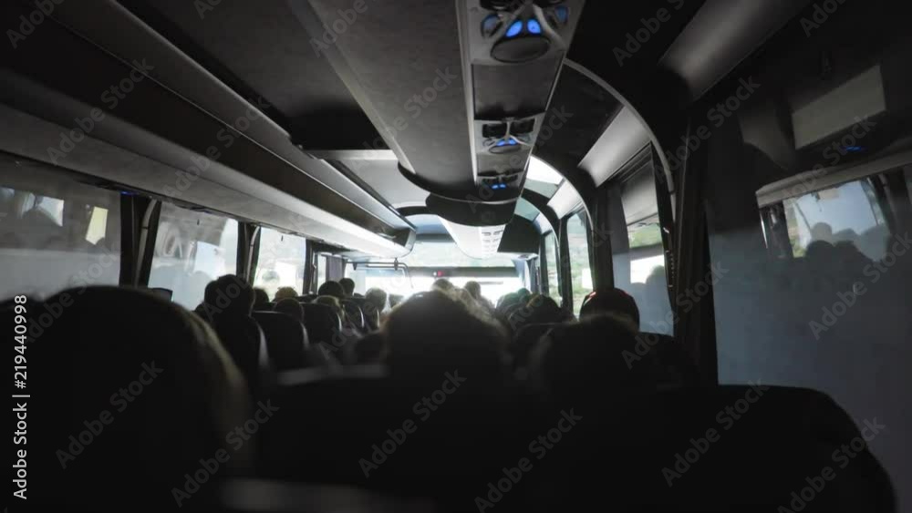 Vidéo Stock View from the back row inside of the modern bus full of ...