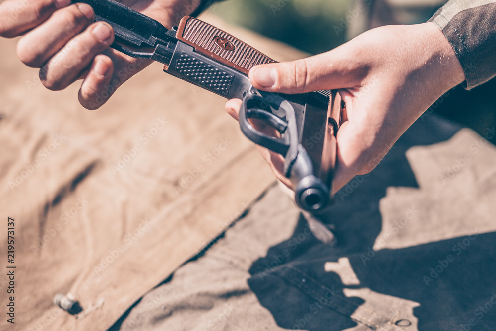 The instructor shows how to disassemble and assemble a Makarov pistol ...