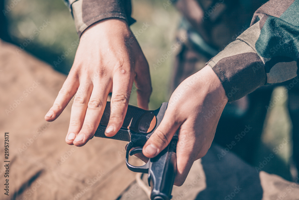 The instructor shows how to disassemble and assemble a Makarov pistol ...