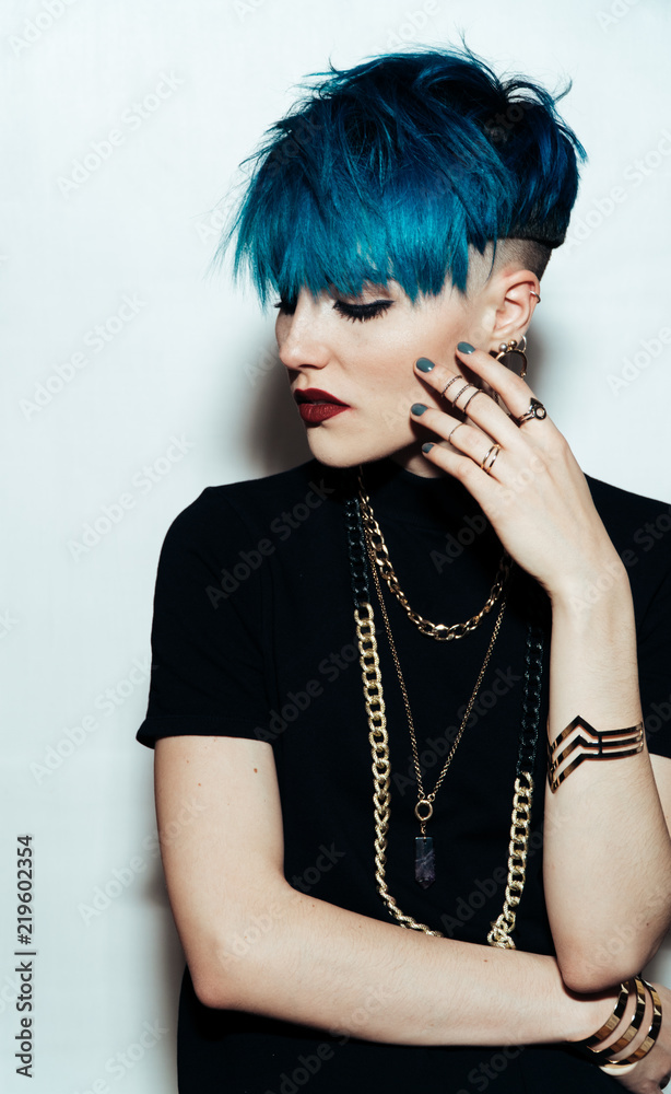 fashion photography of a girl with blue hair on a white background ...