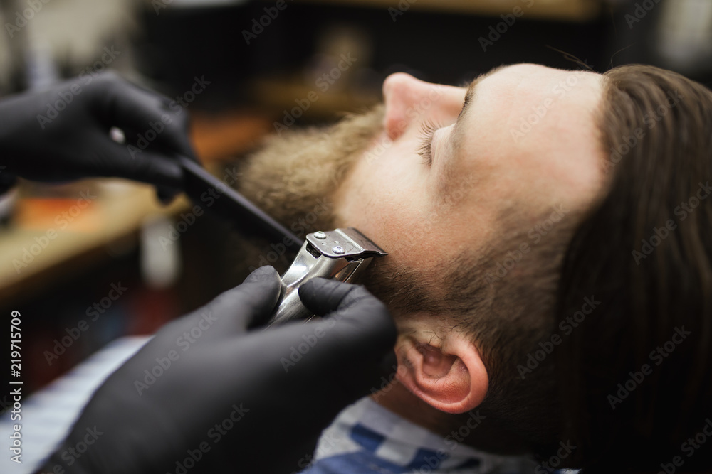 Hipster young good looking man visiting barber shop. Trendy and stylish ...