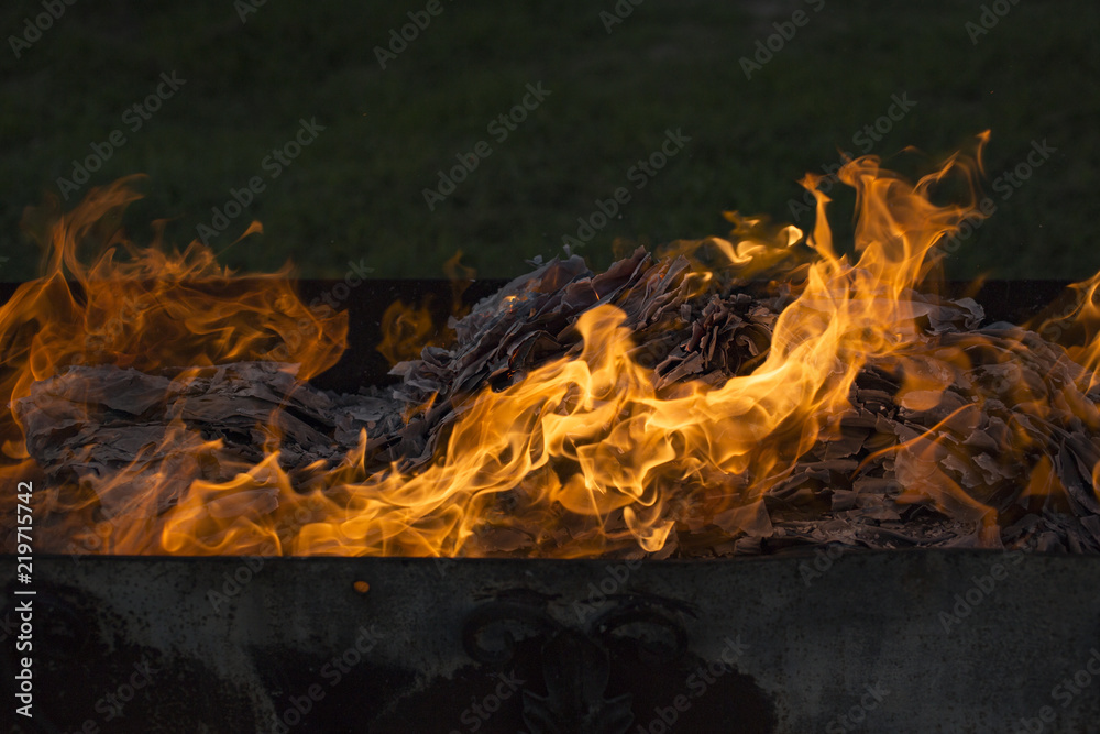 Flaming fire. Documents burning. Dance of fire spirits. Ignition of ...
