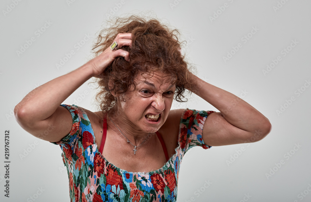 Angry mature lady Stock Photo | Adobe Stock