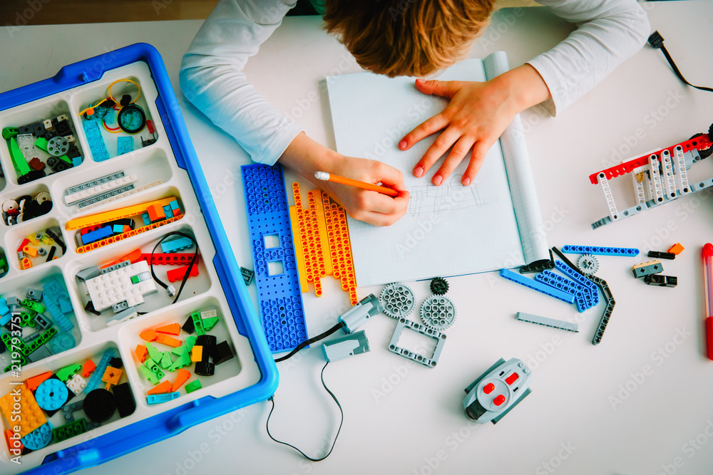 child building robot at robotic technology school lesson Stock Photo ...