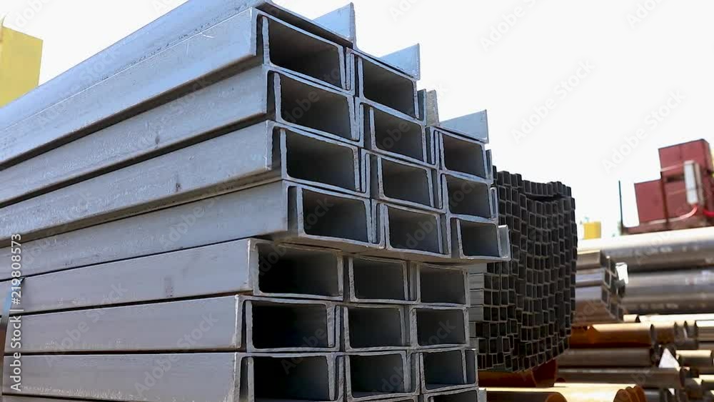 The metal channel laid in rows in the open metal warehouse, the large ...