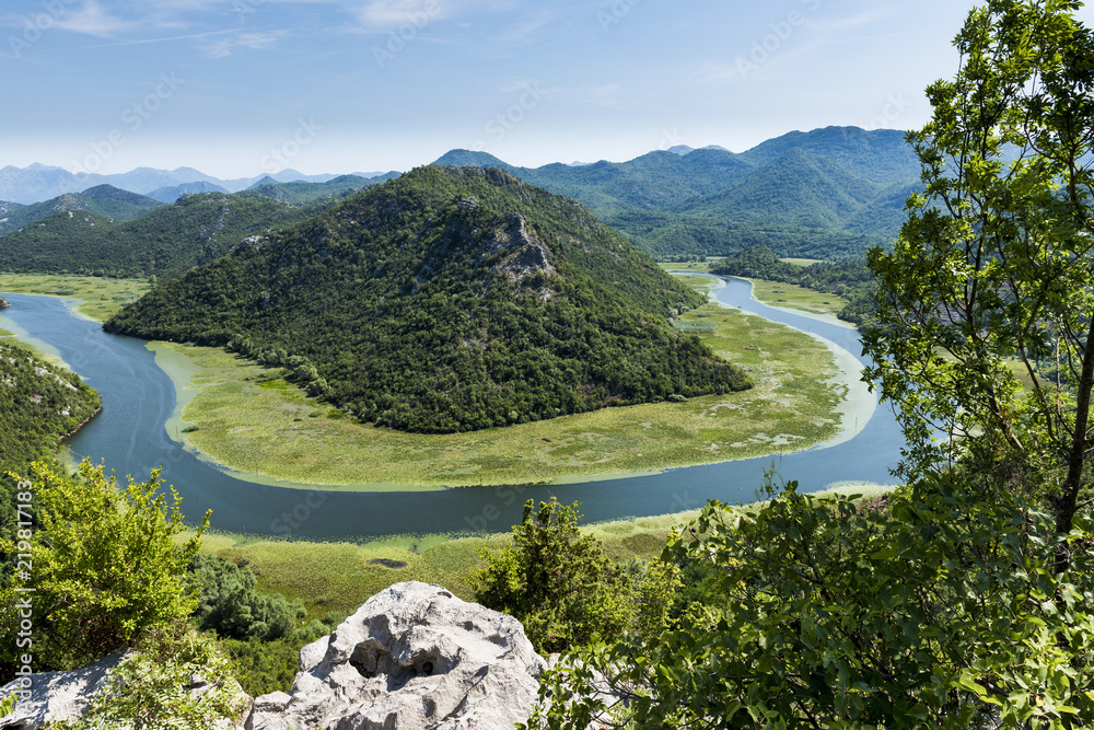 The horseshoe bend of the Rijeka Crnojevica River in Montenegro. This ...
