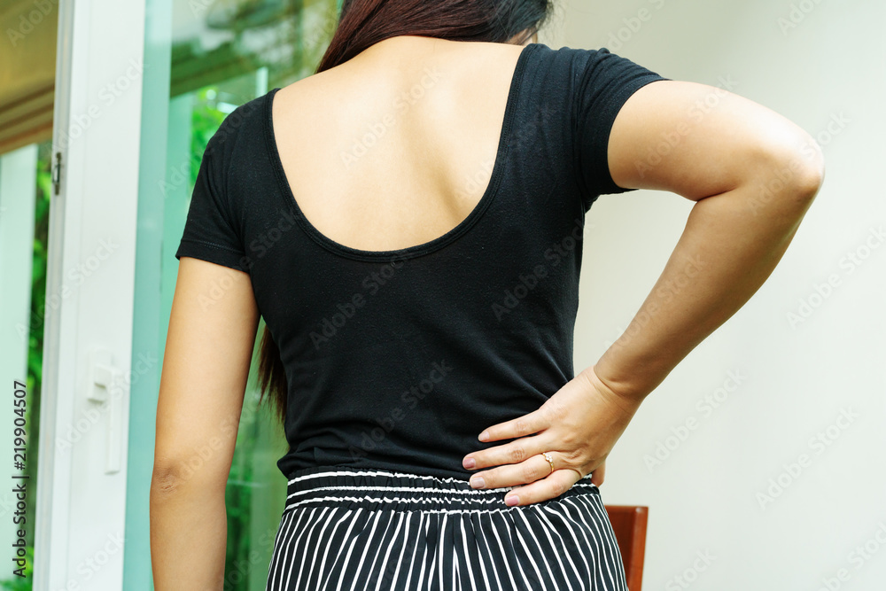 back pain at home. women suffer from backache. healthcare and medical ...