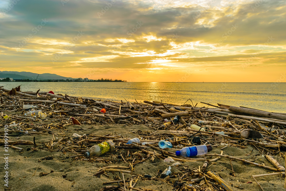 Plastics garbage on beach. Reduce Reuse Recycle. Environmental marine ...