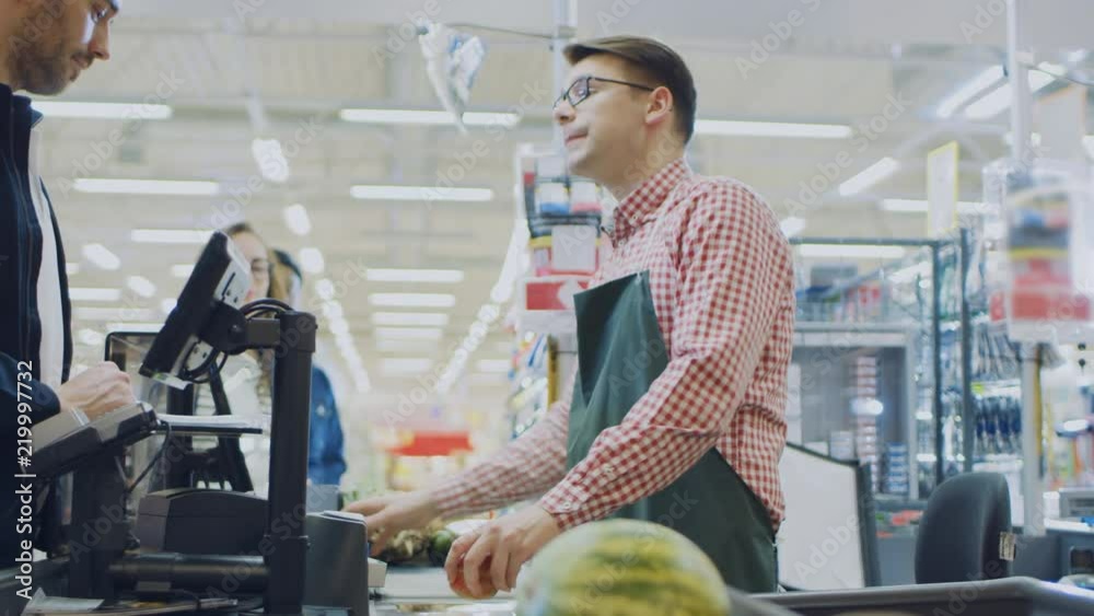 At the Supermarket: Checkout Counter Happy Customer Chats with Friendly ...