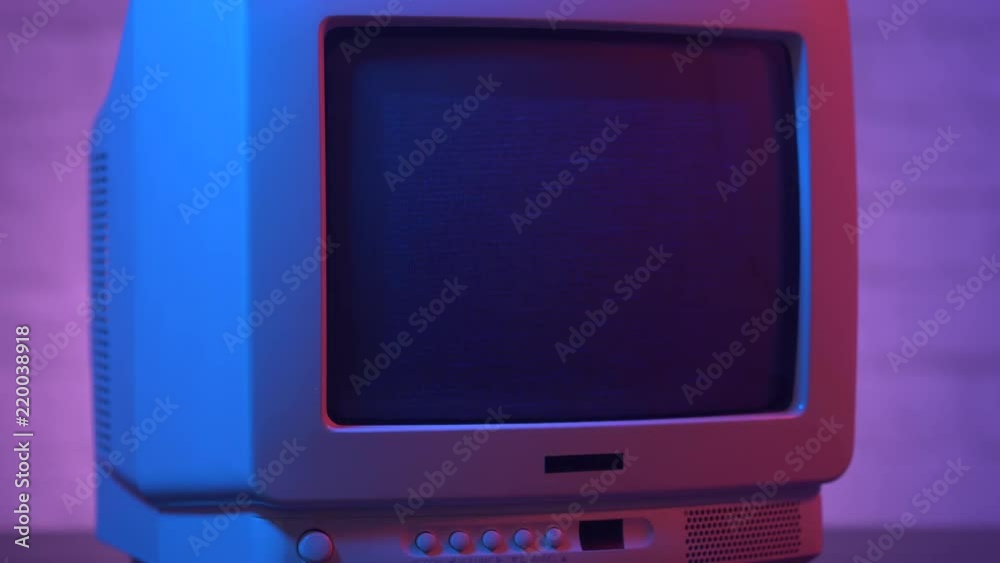 Game Over flashing on a retro video game TV from the 80s or 90s ...