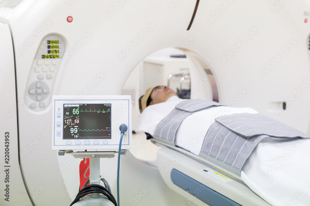 Process of CT scanning of an old patient. Man Receiving a Medical Scan ...