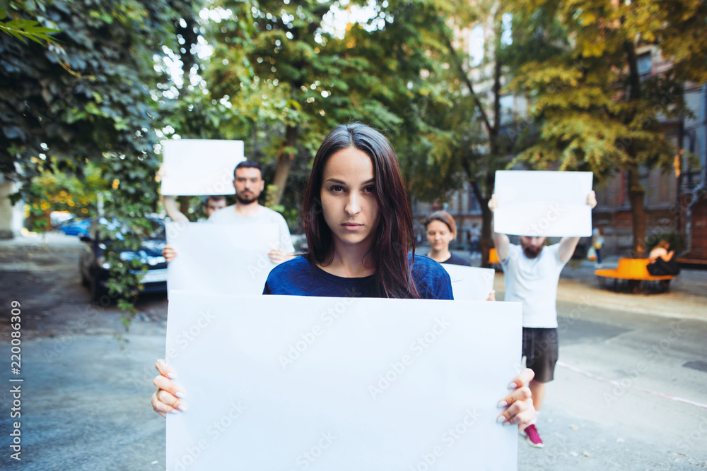 Group of protesting young people outdoors. The protest, people ...