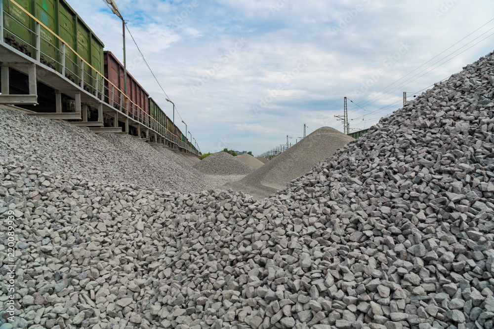 Railway. Transportation of crushed stone by rail. Unloading railway ...