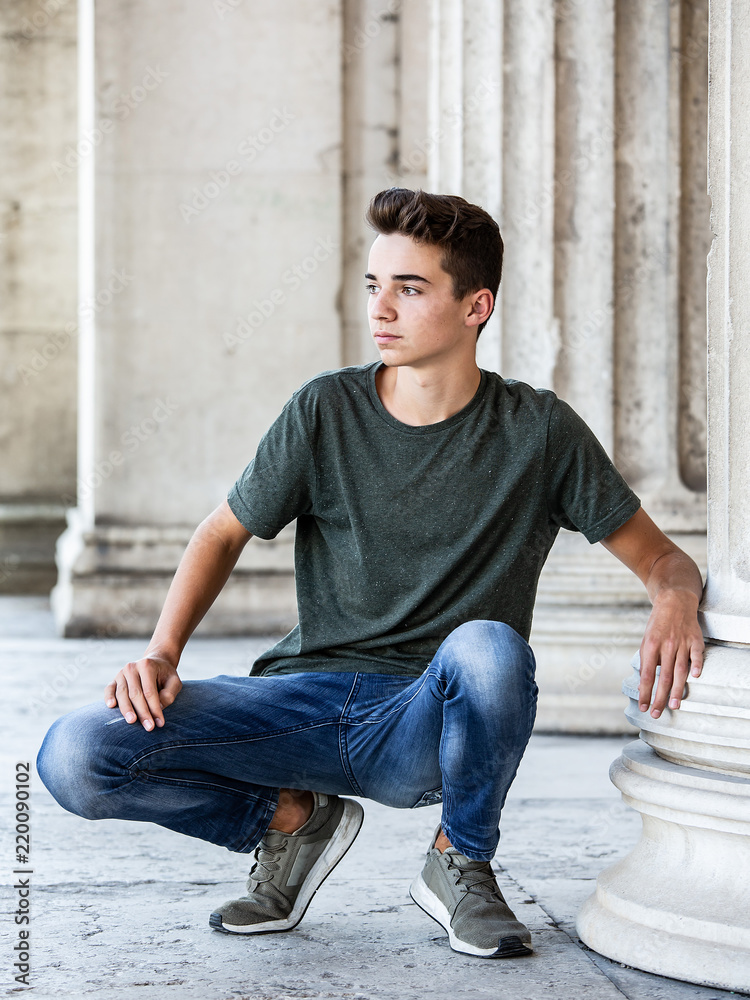 Jugendlicher - Junger Mann im antiken Ambiente Stock Photo | Adobe Stock