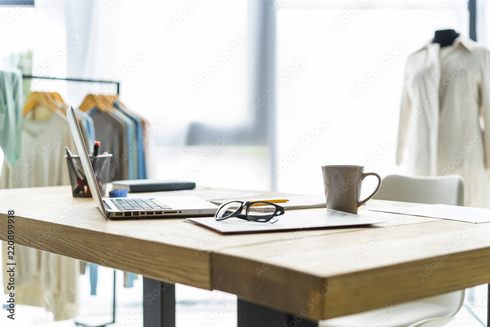 Creative fashion designer desk or workplace with sewing equipment ...