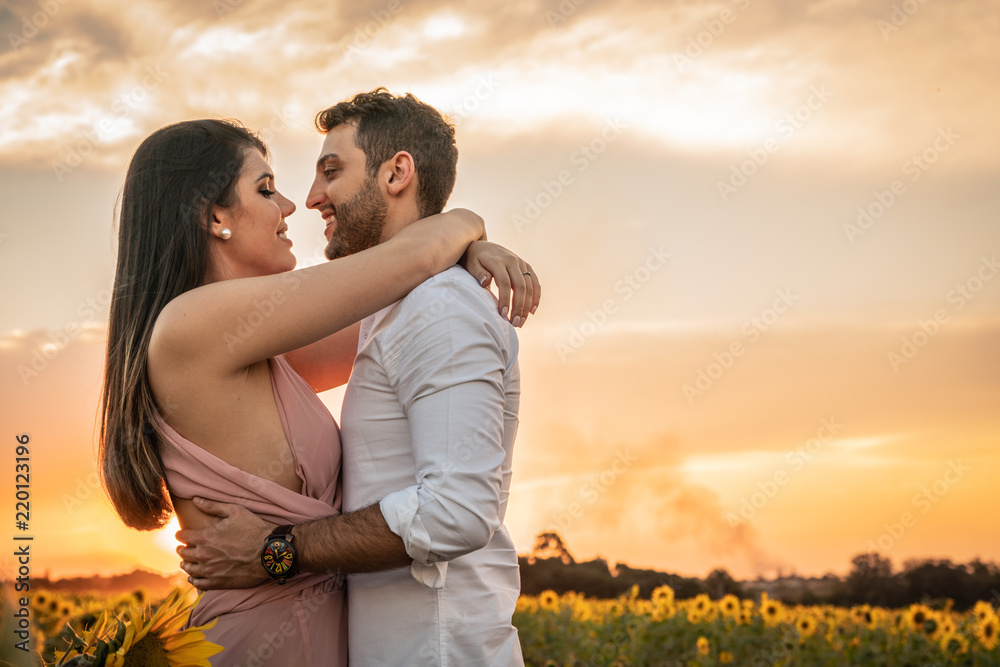 Romantic Couple on a Love Moment in a Sunflower field at Holambra, Sao ...