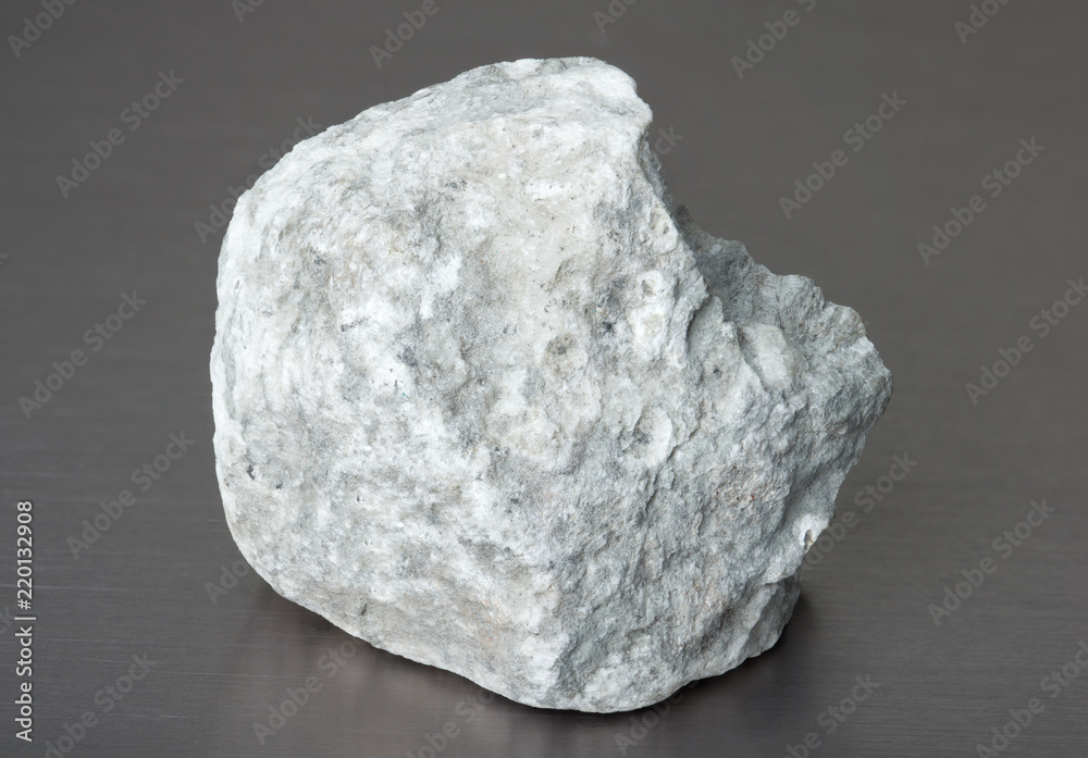 Specimen of mineral gypsum on gray background Stock Photo | Adobe Stock