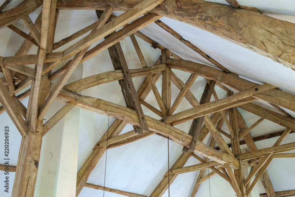 Looking up at the massive restored interior timber roof construction in ...